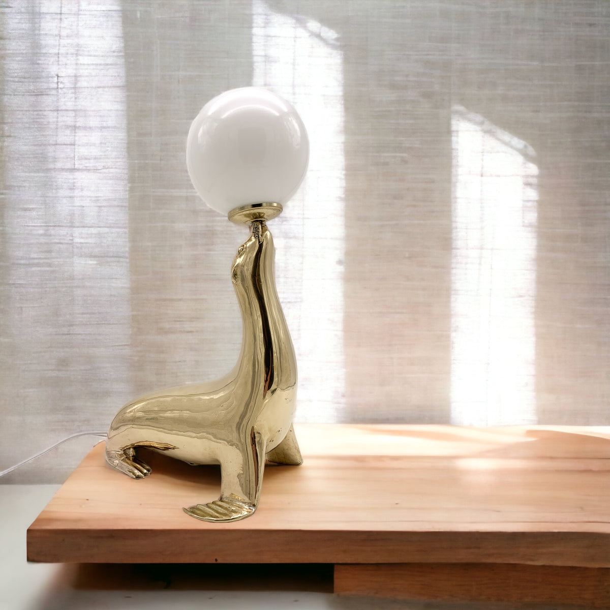 Lampe otarie vintage en laiton – Marcette